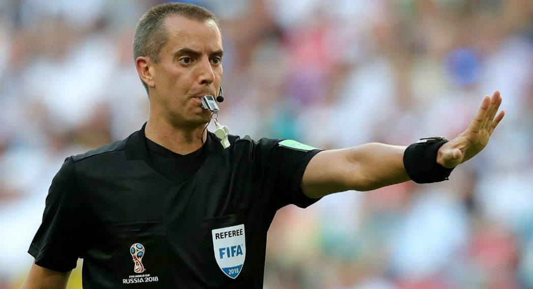 Referee Mark Geiger - QED.NG