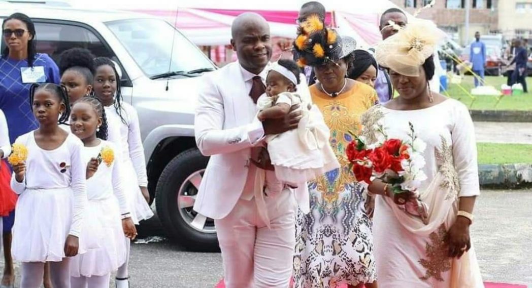 Patrick-Henry-Edet-ex-Catholic-priest-dedicates-child - QED.NG